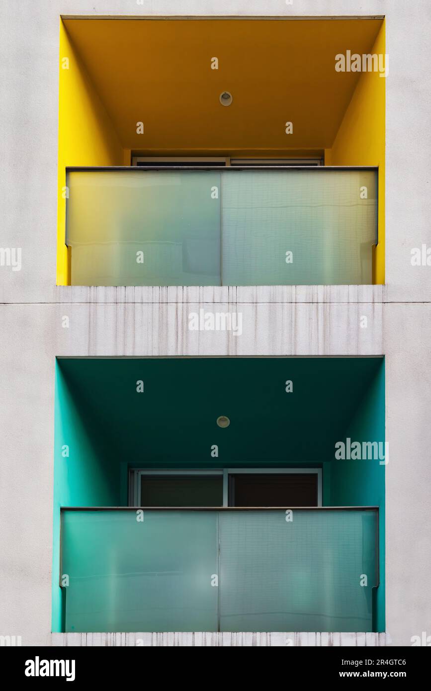 picture of colorful painted balconies at a concrete apartment building ...