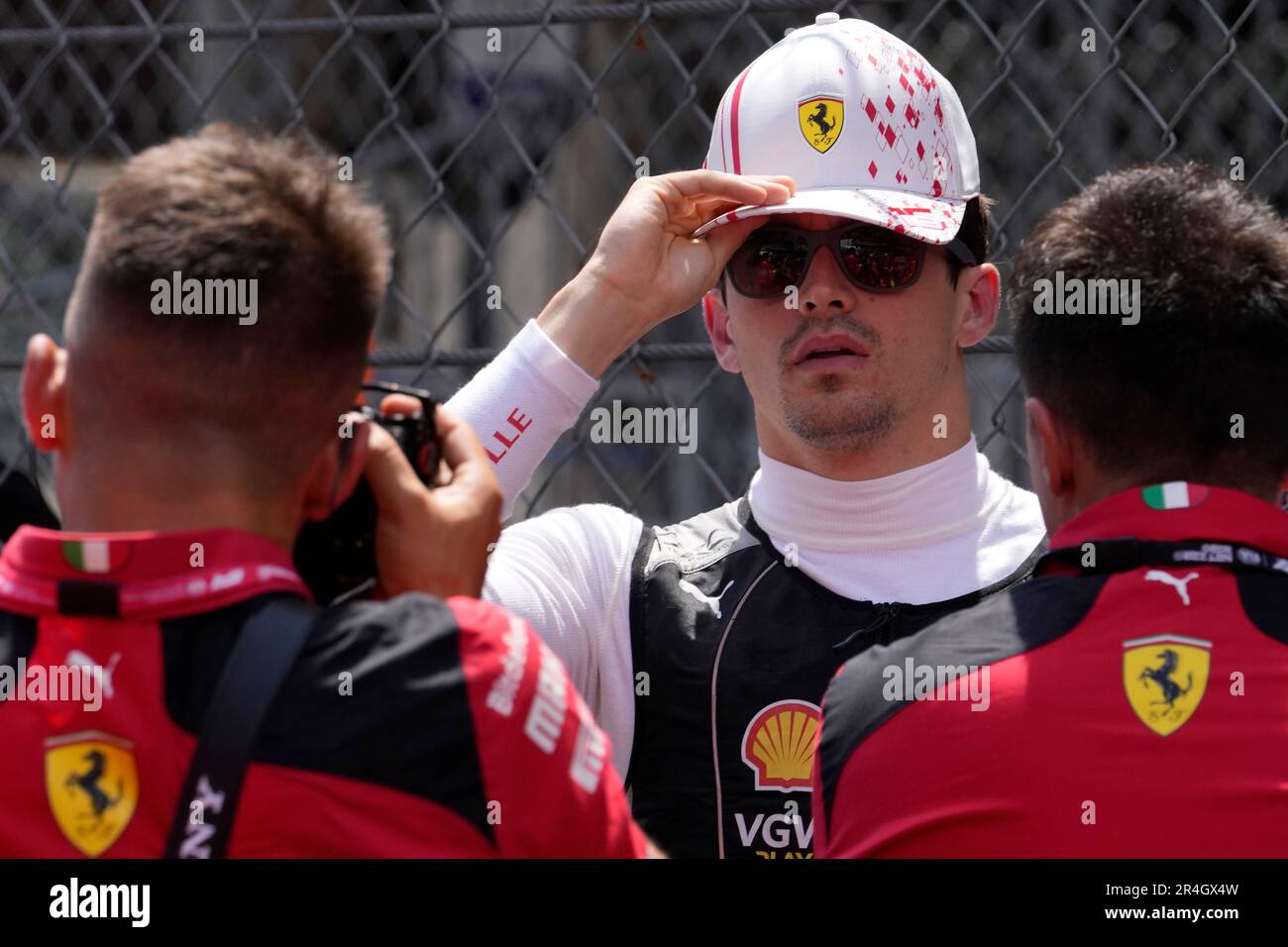 Ferrari driver Charles Leclerc of Monaco, center, prior to the Monaco ...