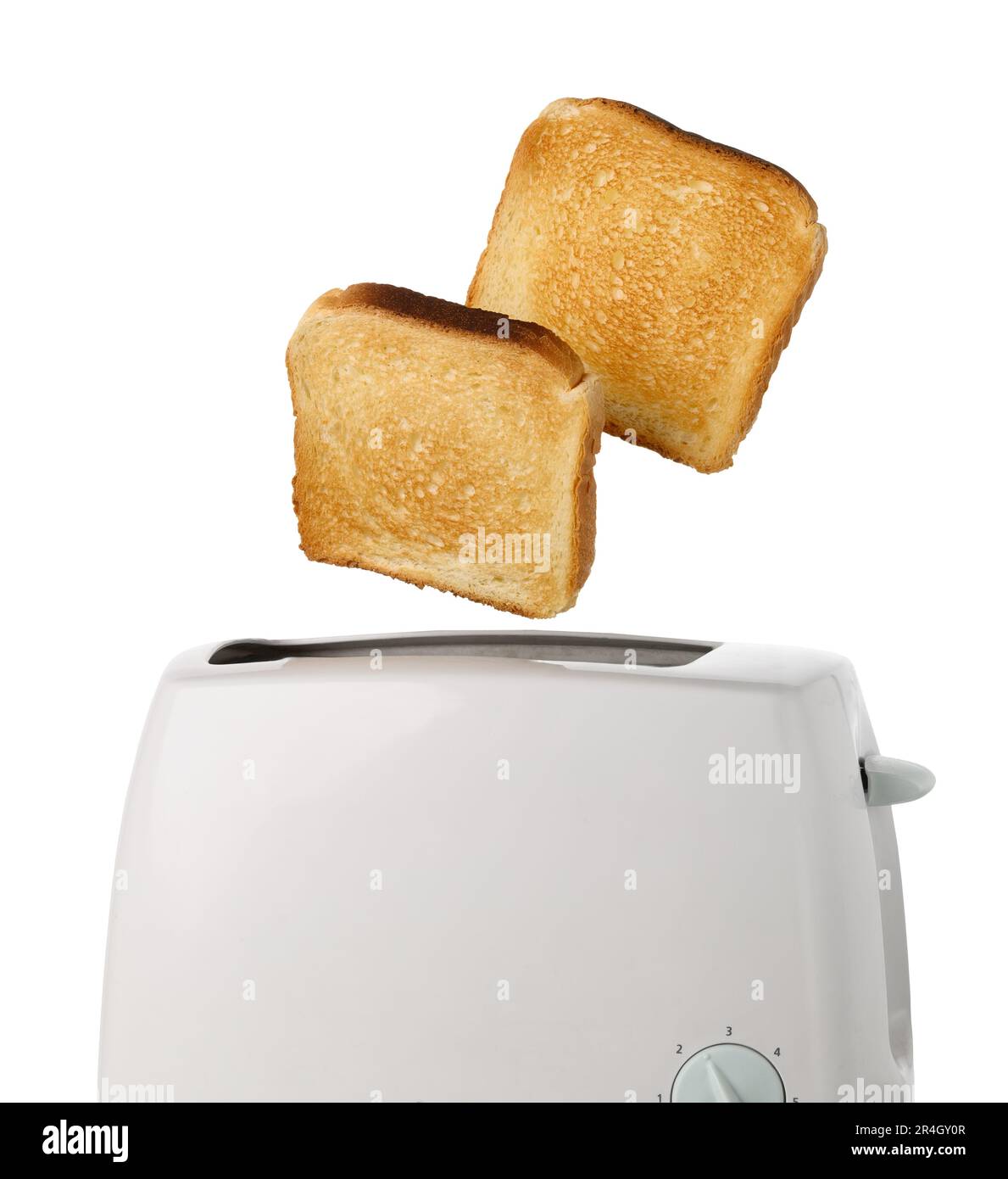 Roasted toast bread and toaster over white background Stock Photo - Alamy