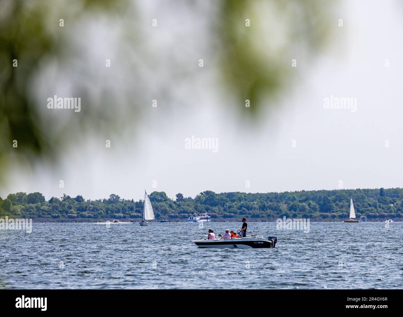 Senftenberg, Germany. 28th May, 2023. Boats sail in the sunshine on ...