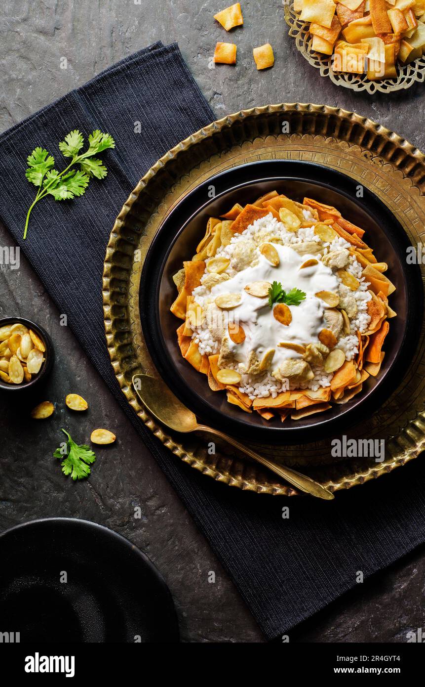 Arabic cuisine; Jordanian Chicken "Mansaf" of white rice and crispy ...