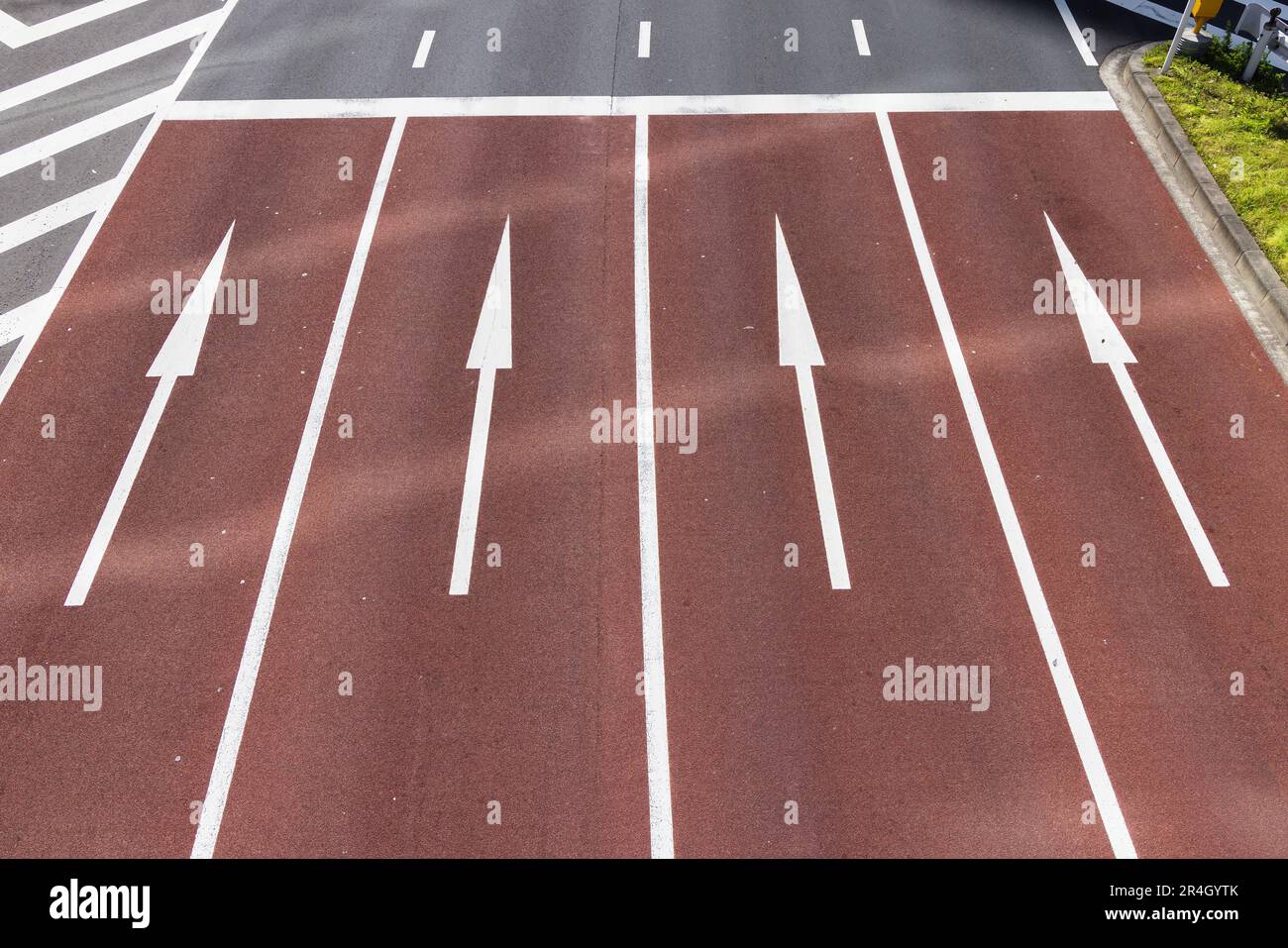 Aerial view of an empty multi-lane road with direction arrows Stock ...