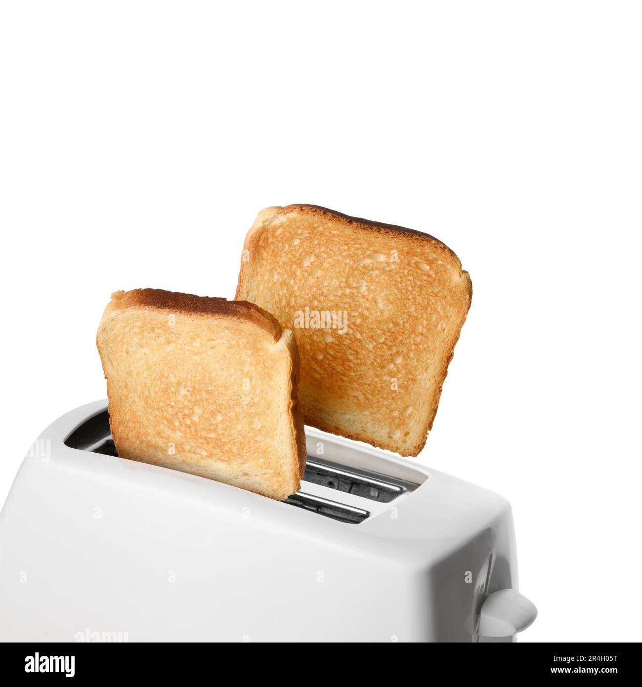 Roasted toast bread and toaster over white background Stock Photo - Alamy