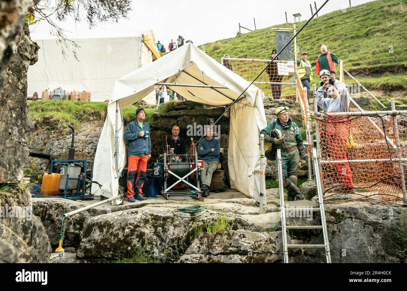 A winch lowers a potholer (not pictured) into Gaping Gill, the largest ...