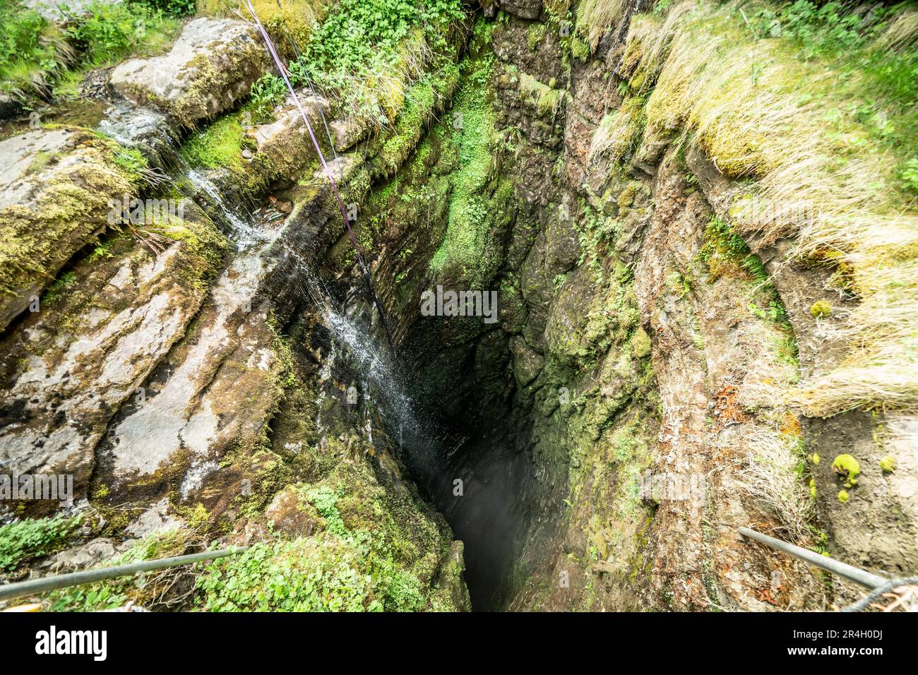 The opening to Gaping Gill, the largest cavern in Britain, situated in ...
