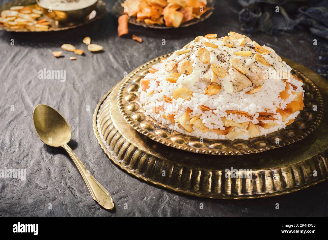 Arabic cuisine; Jordanian Chicken "Mansaf" of white rice and crispy ...