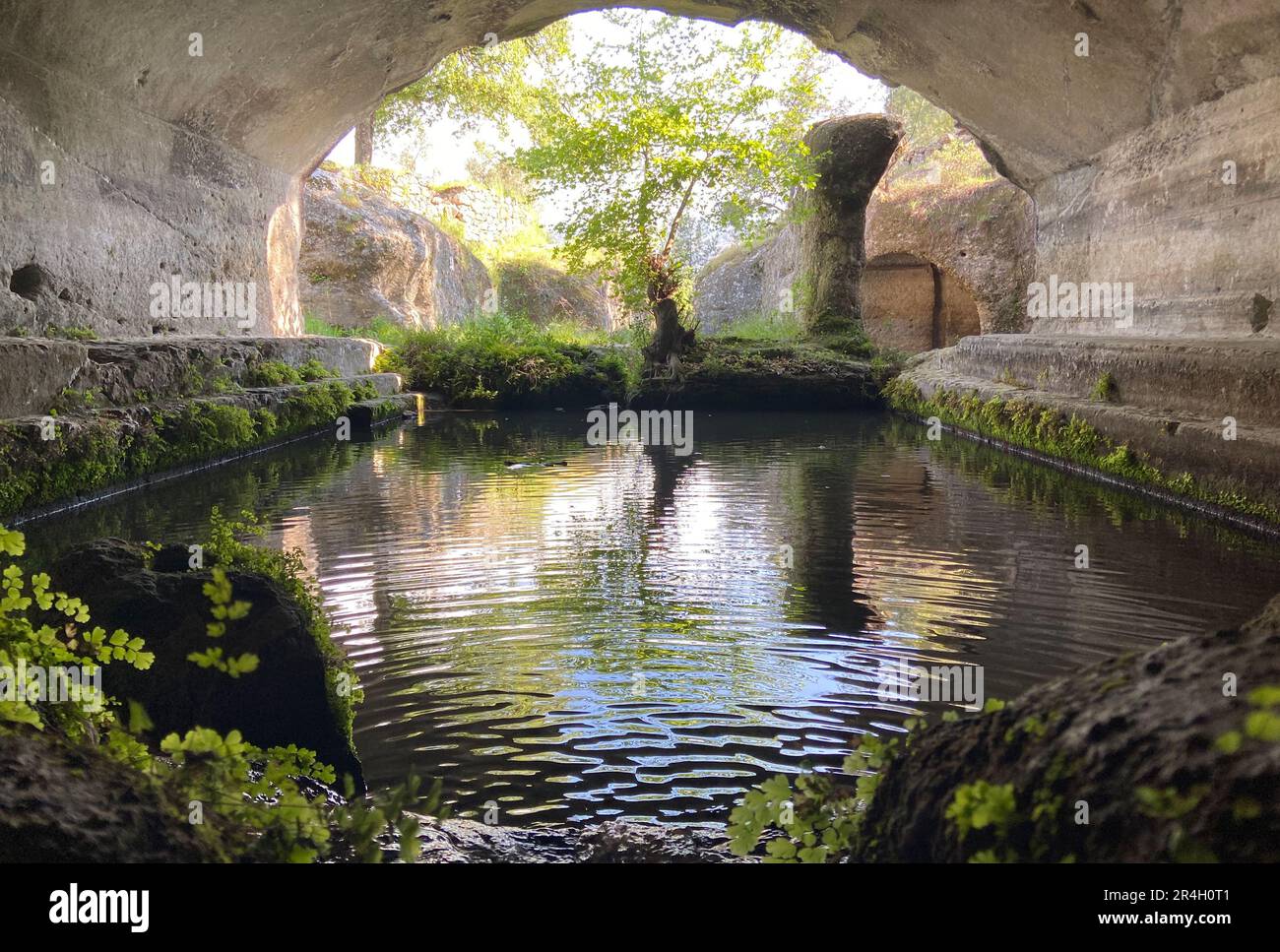 Historical ancient ruins bath temple, Bath of Cleopatra, an old human ...