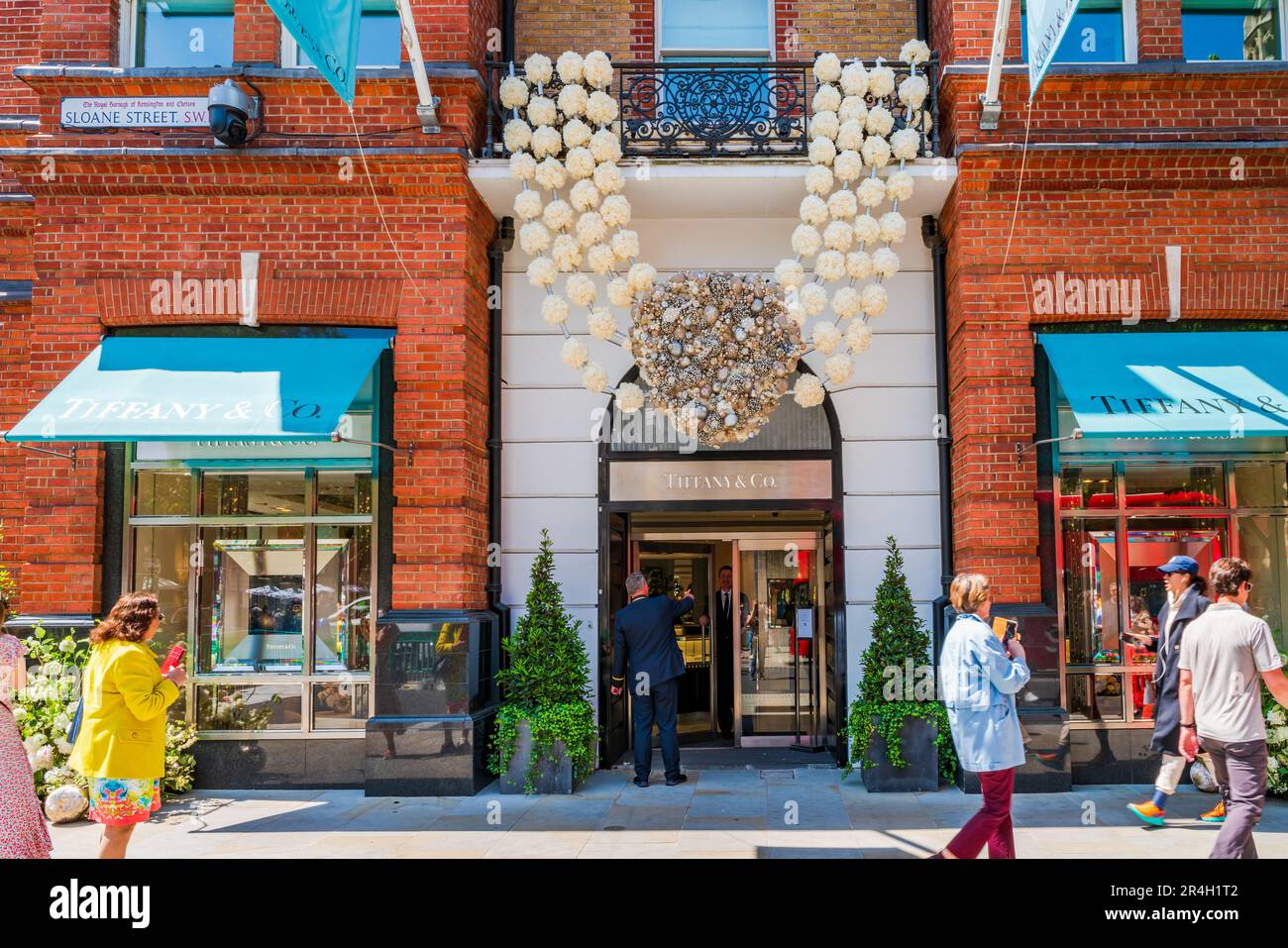 LONDON, UK - MAY 24, 2023:A spectacular floral display decorates window ...