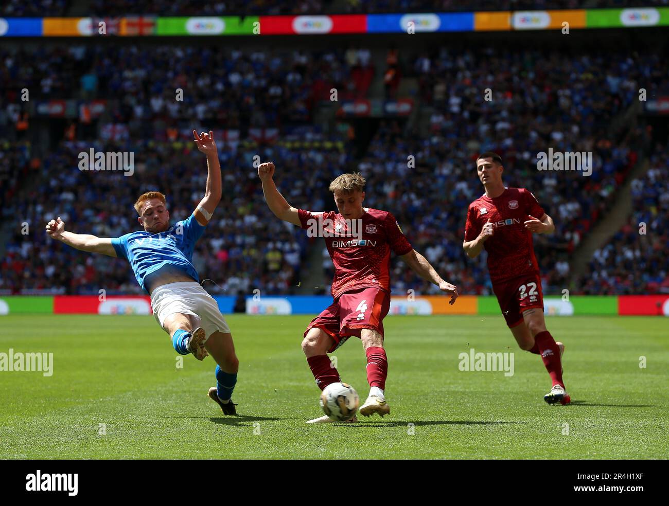 Stockport County's Callum Camps (left) challenges Carlisle United's ...