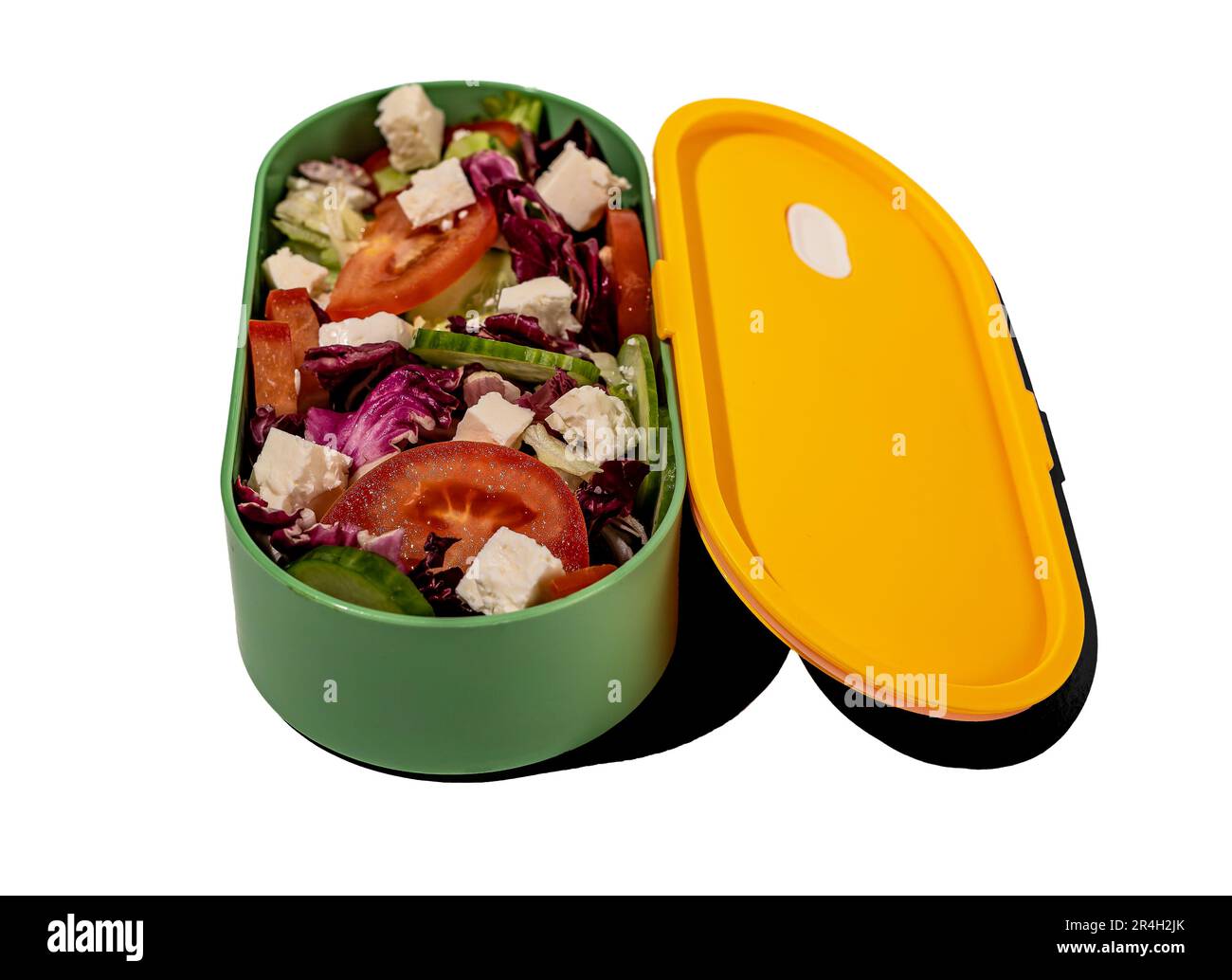 Healthy salad for dinner in plastic lunch box. Vegetable mix inside ...