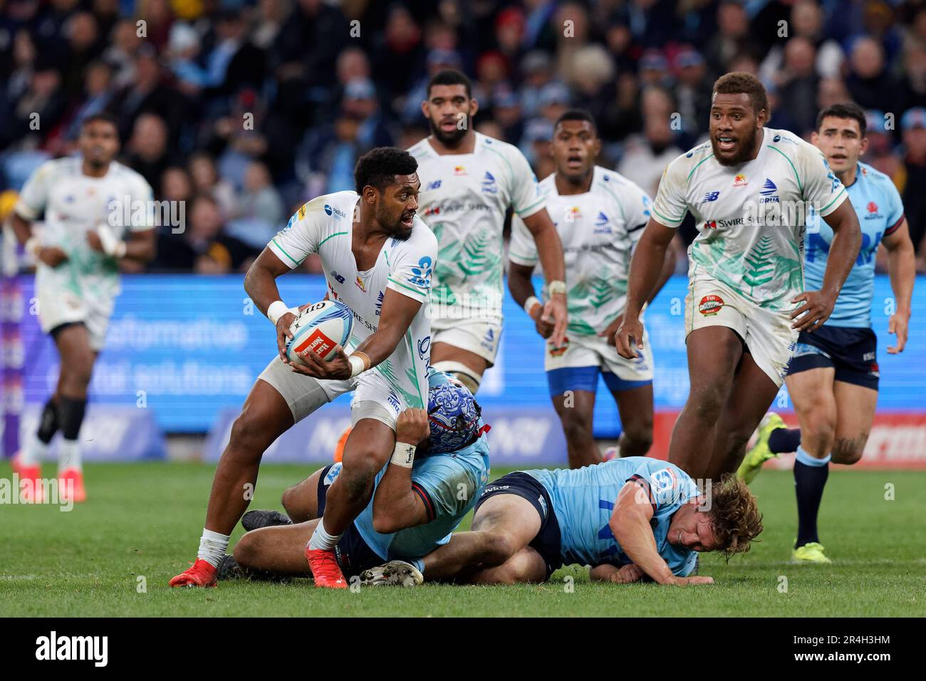 Ilaisa Droasese of Fiji prepares to pass the ball during the Super ...