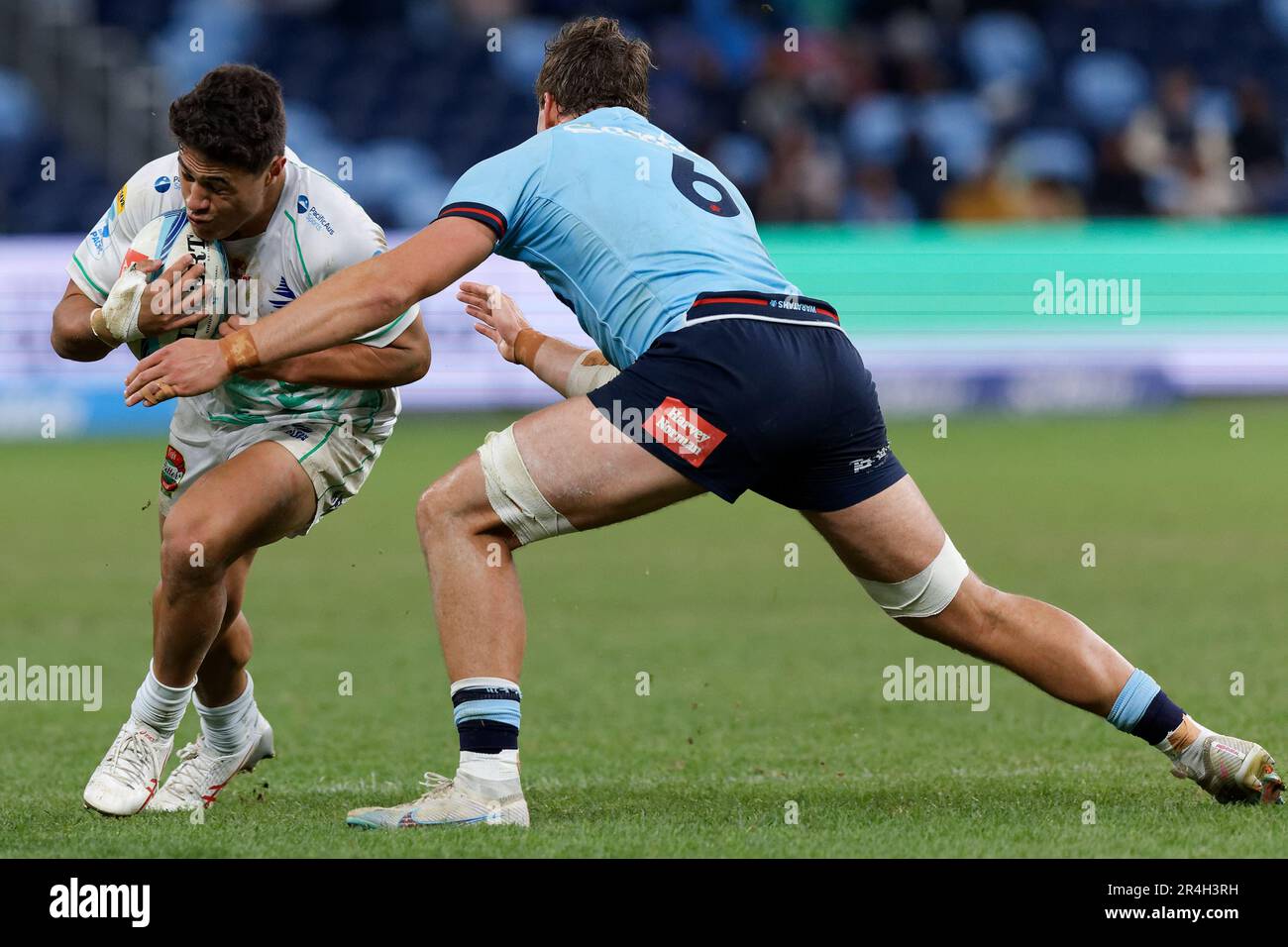 Caleb Muntz of Fiji is tackled during the Super Rugby Pacific match ...
