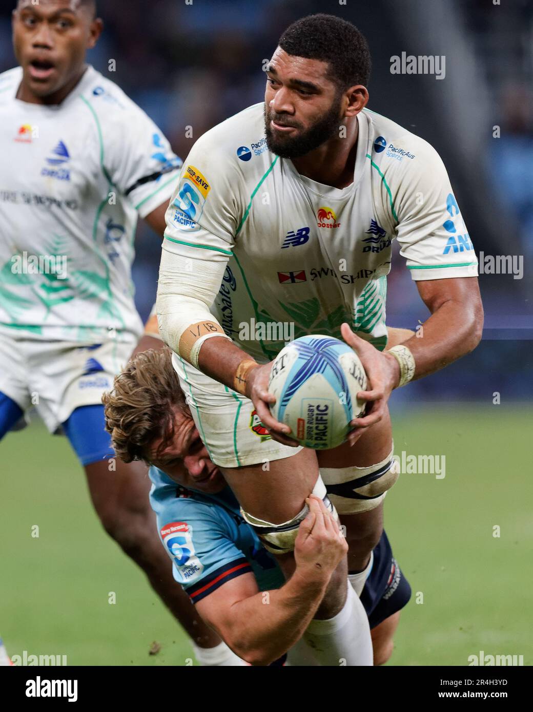 Meli Derenalagi of Fiji is tackled during the Super Rugby Pacific match ...