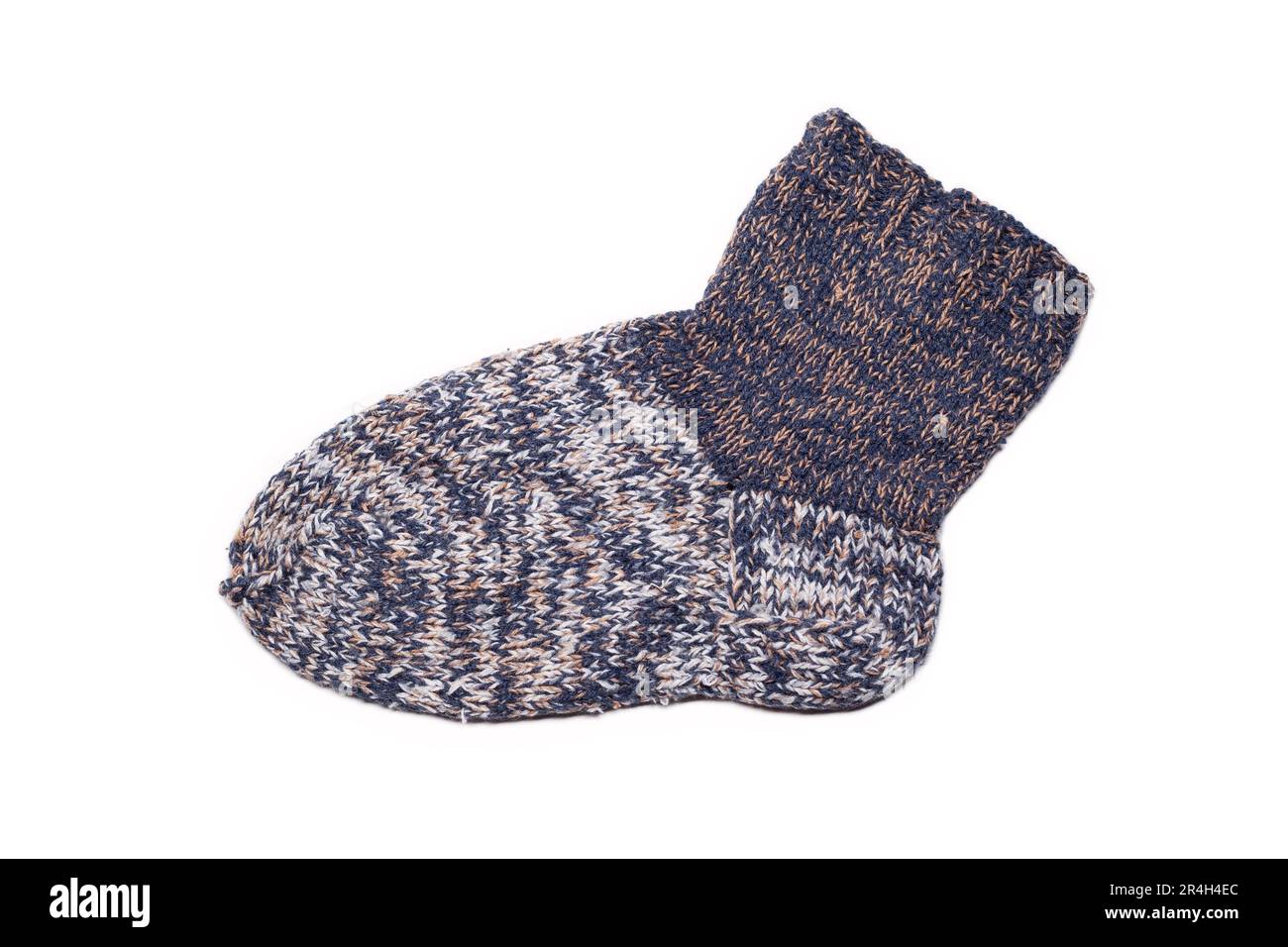Knitted wool, handmade sock on a white background Stock Photo - Alamy