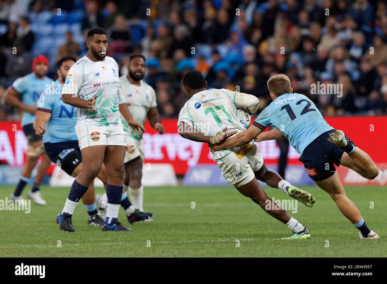 Taniela Rakuro of Fiji is tackled during the Super Rugby Pacific match ...