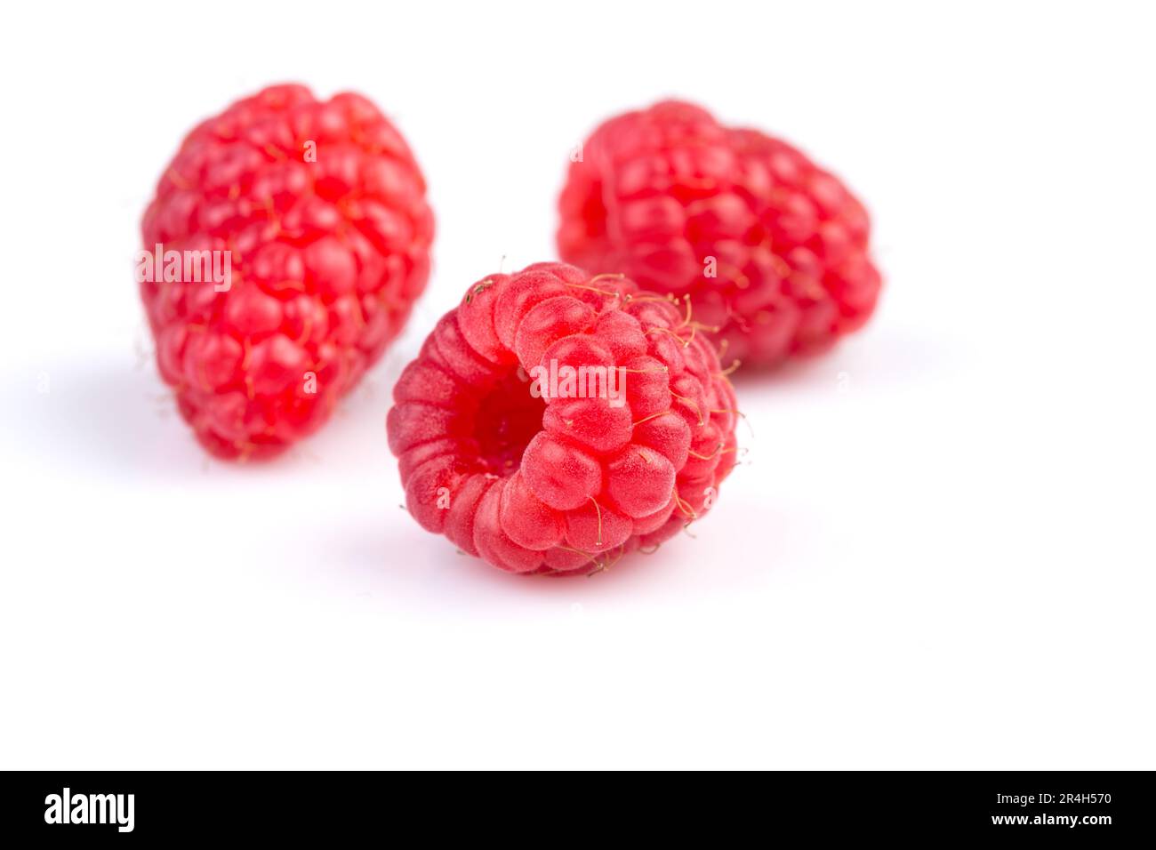 Fresh raspberry isolated on a white background Stock Photo - Alamy
