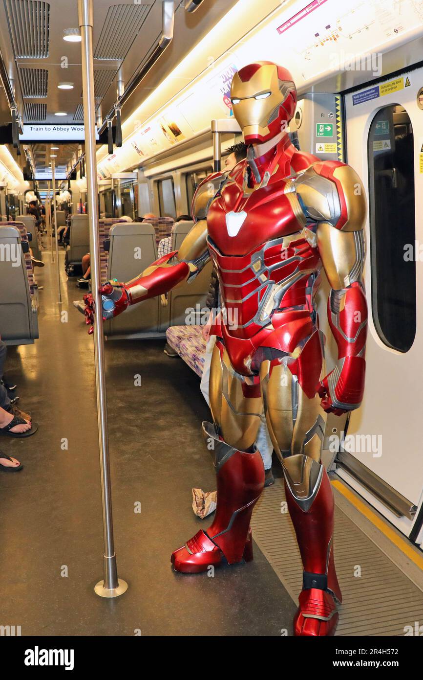 London, UK. 28th May, 2023. Iron Man riding the Elizabeth Line to MCM ...