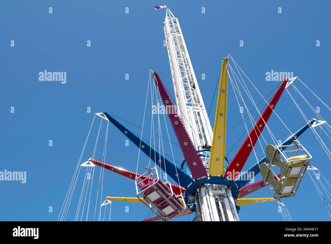 Merry go round funfair carnival ride red chair hi-res stock photography ...