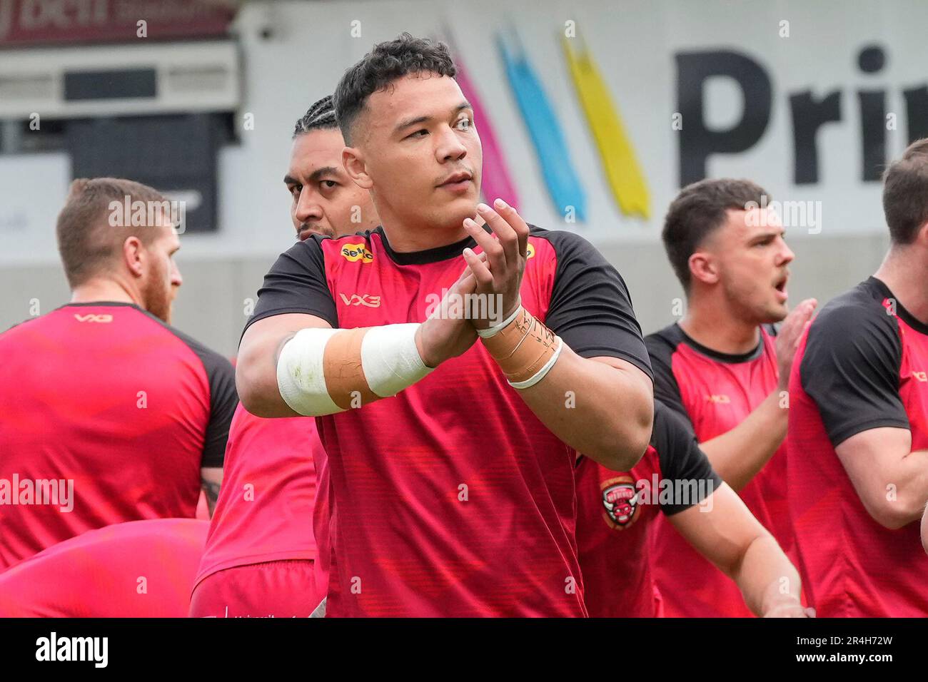Tyler Dupree #16 of Salford Red Devils salutes the fans before the ...