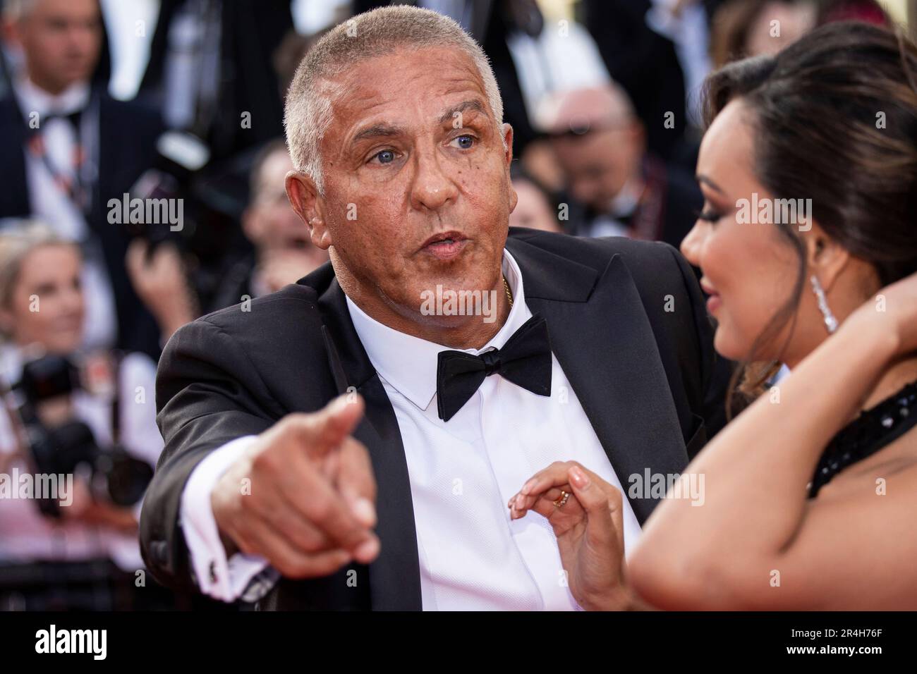 Samy Naceri and Sofia Athena pose for photographers upon arrival at the ...