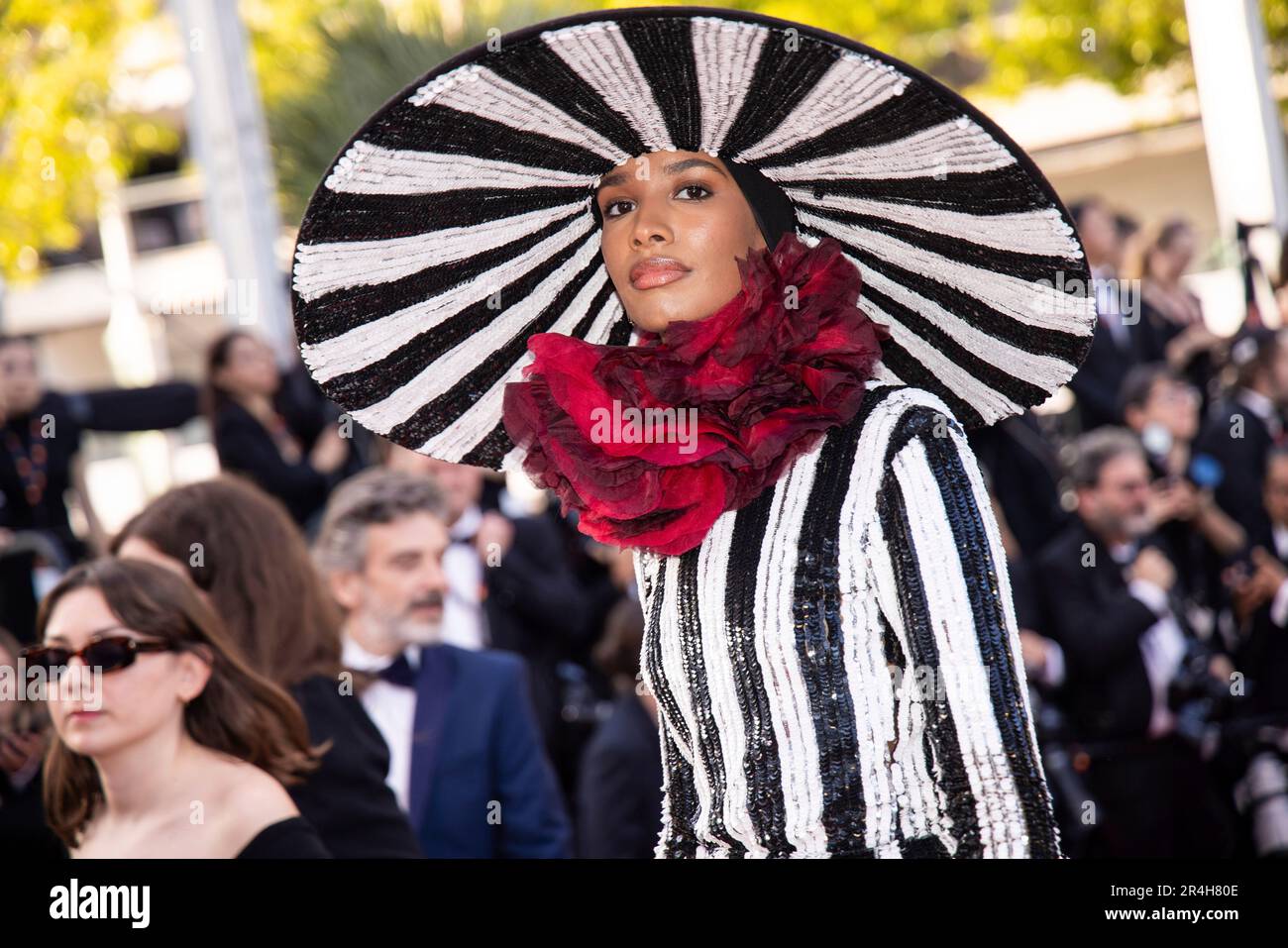 Ikram Abdi poses for photographers upon arrival at the awards ceremony ...