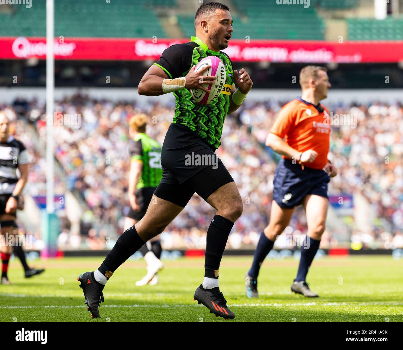 Bryn Hall of the World XV runs in to score a try during the Killik Cup ...