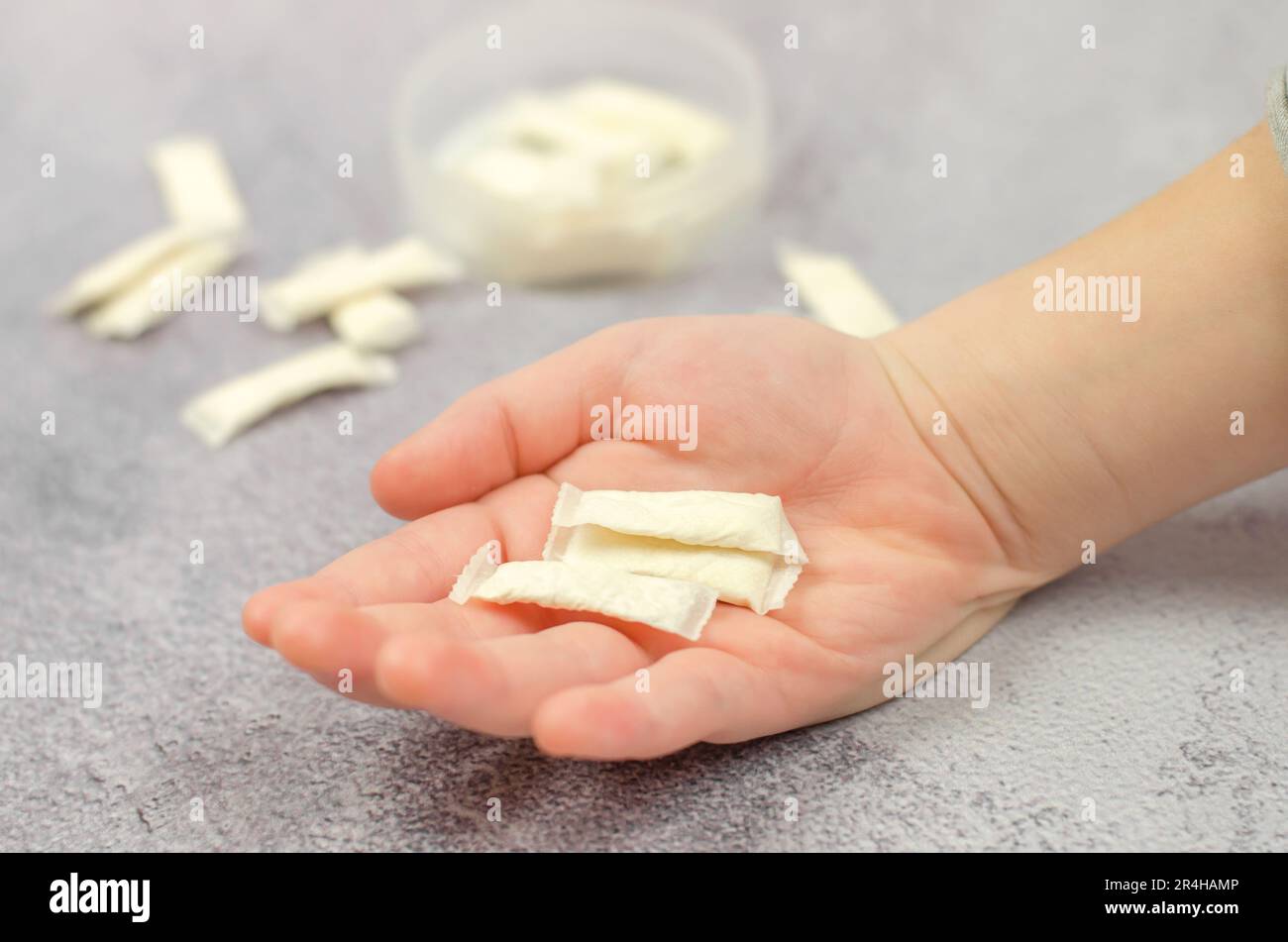 Swedish snus in a child's hand. Child drug addiction concept Stock ...