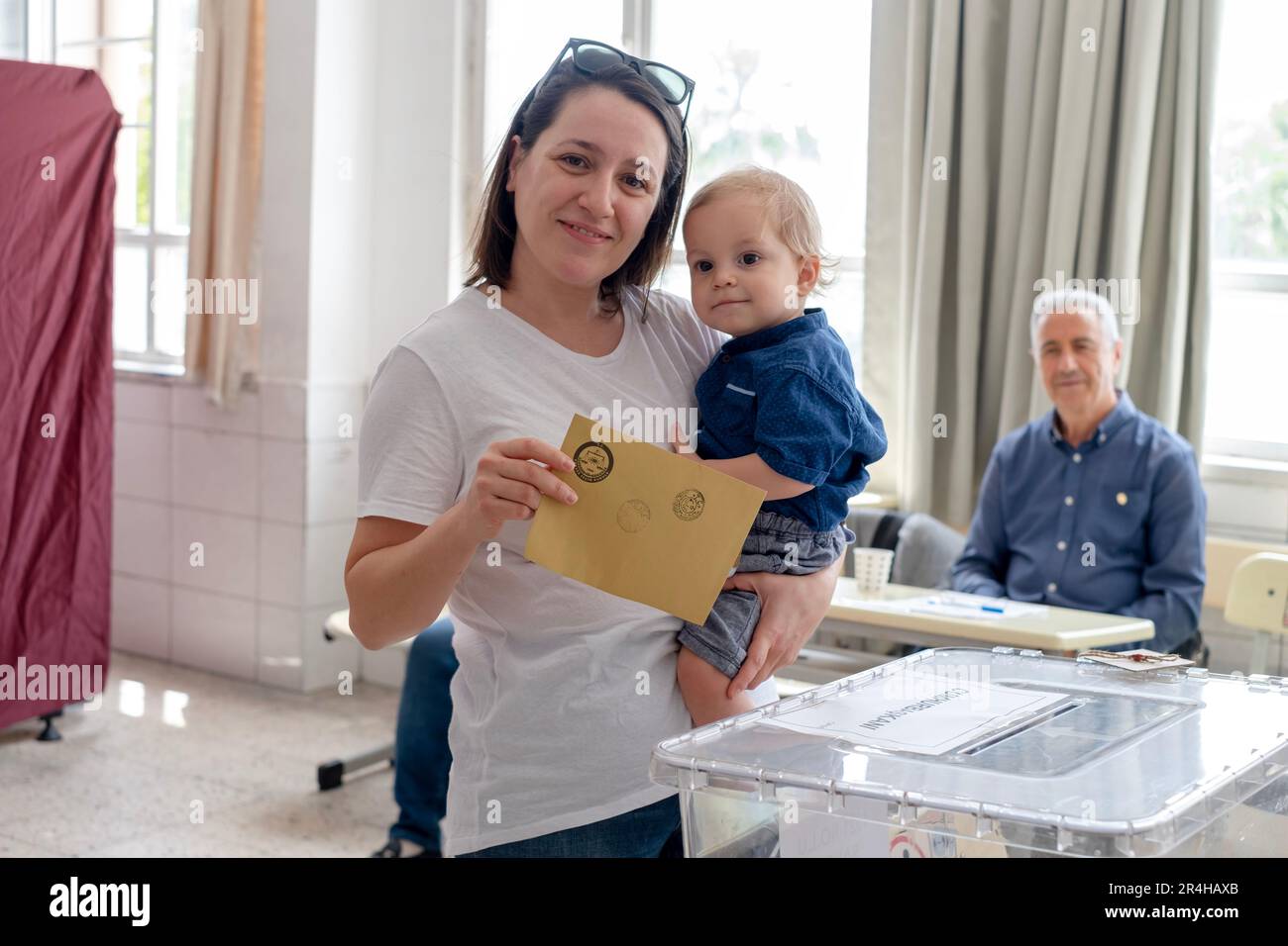 Together with her mother and baby, they are voting in the 2023 Turkish ...