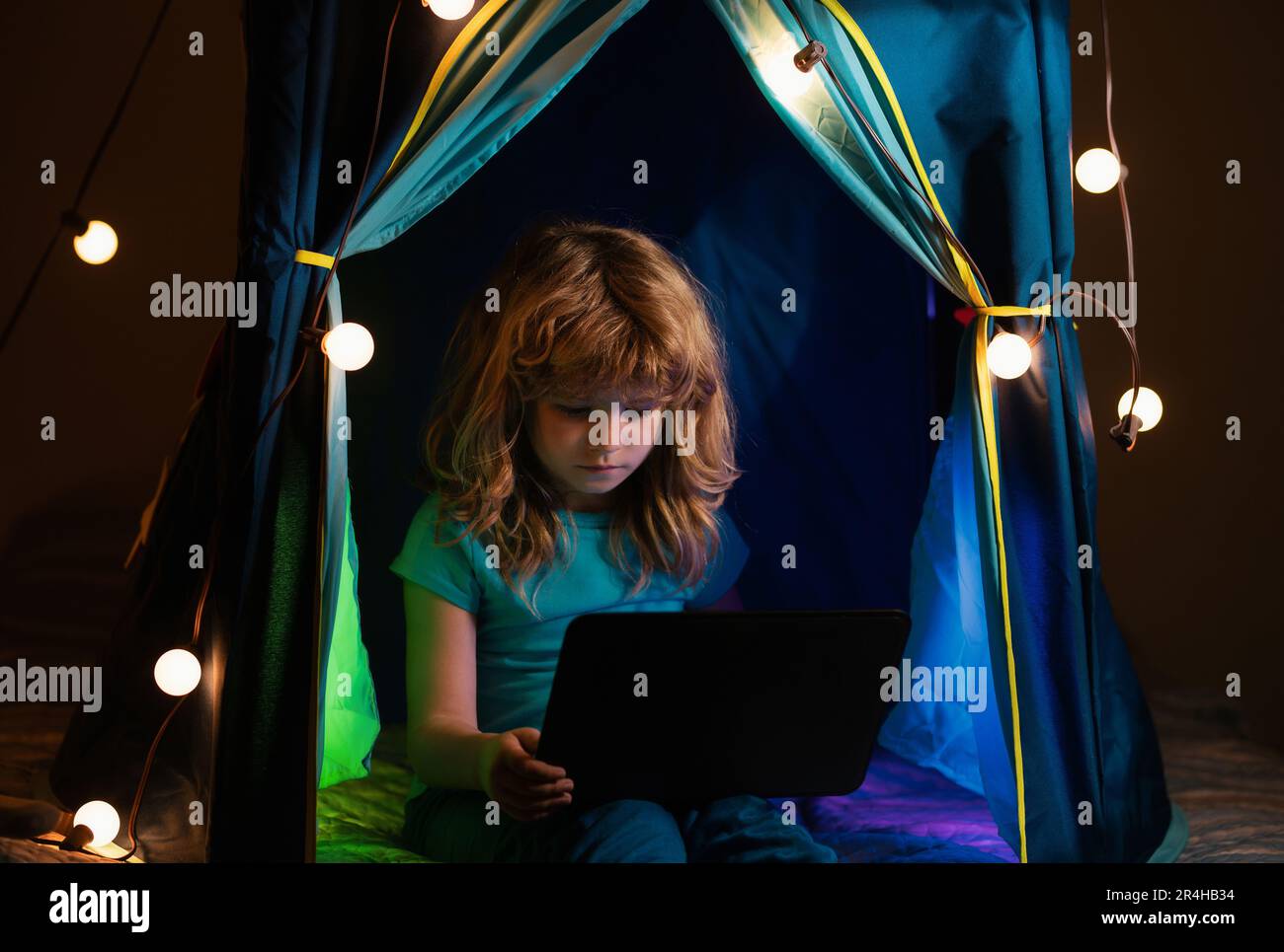 Video game children playing with video games in their bedroom hi-res ...