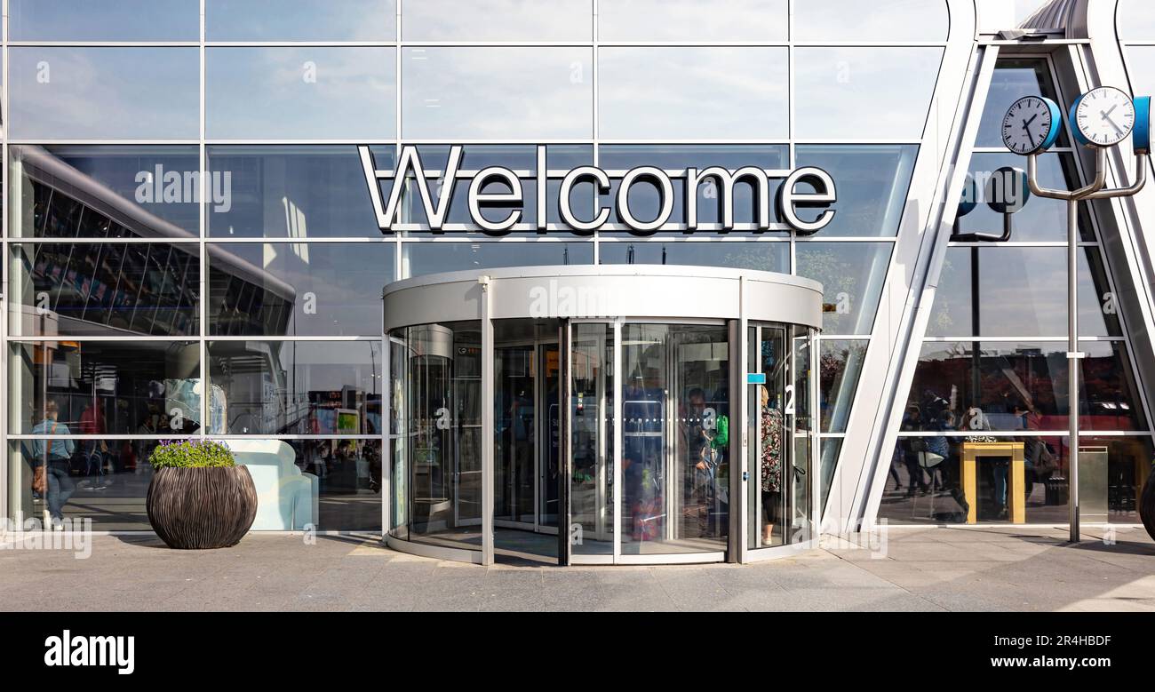 Welcome sign, big letters text at Eindhoven airport terminal entrance ...