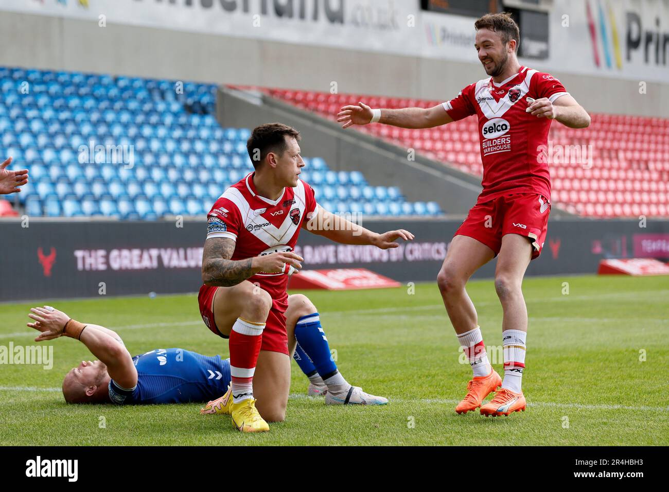 Salford Reds' Deon Cross celebrates scoring a try during the Betfred ...