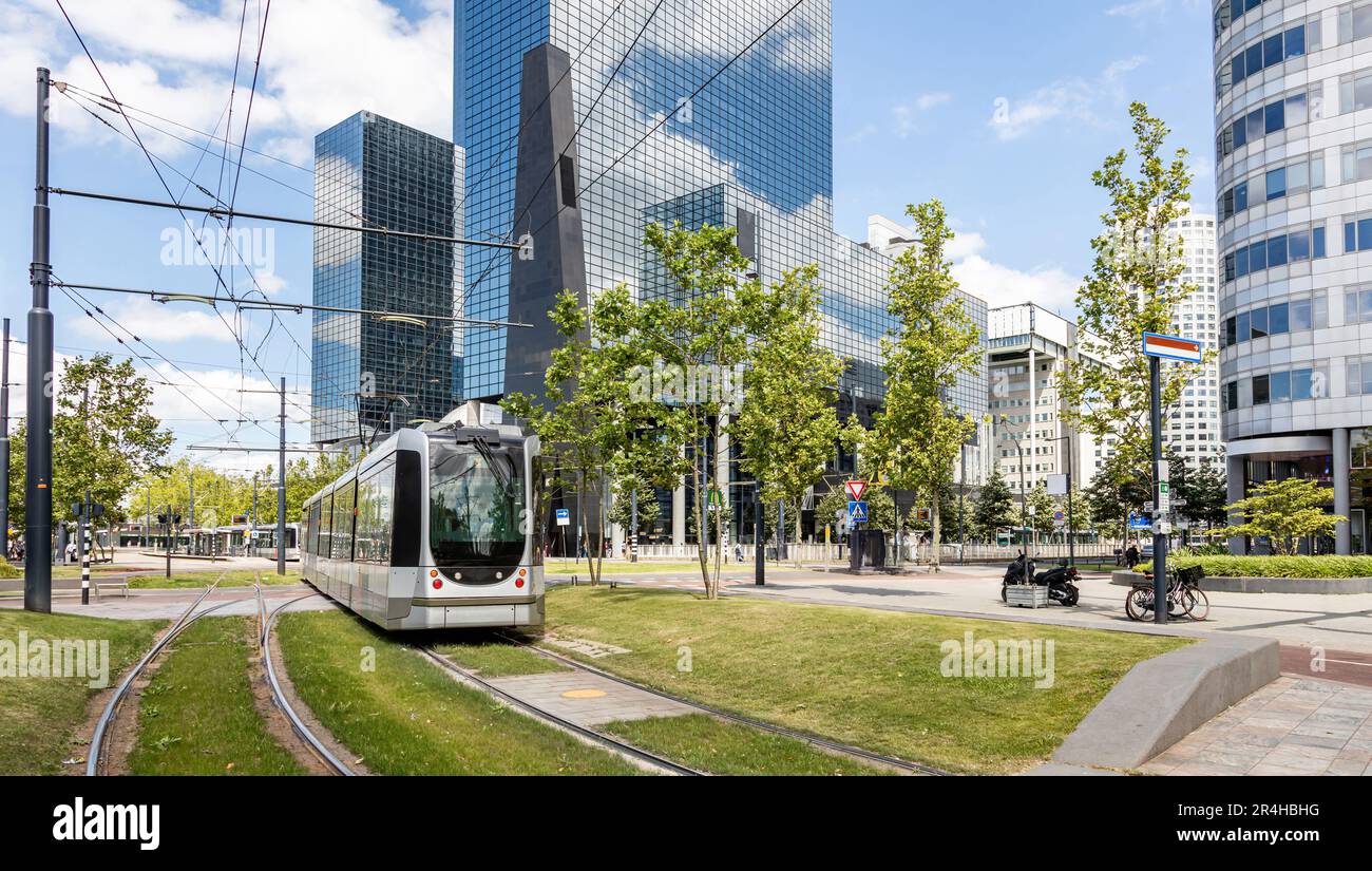 Tram in the city center, public transportation, modern buildings ...