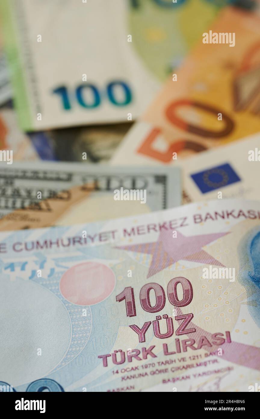 100 turkish lira on us and Eu currency background. Turk money theme ...