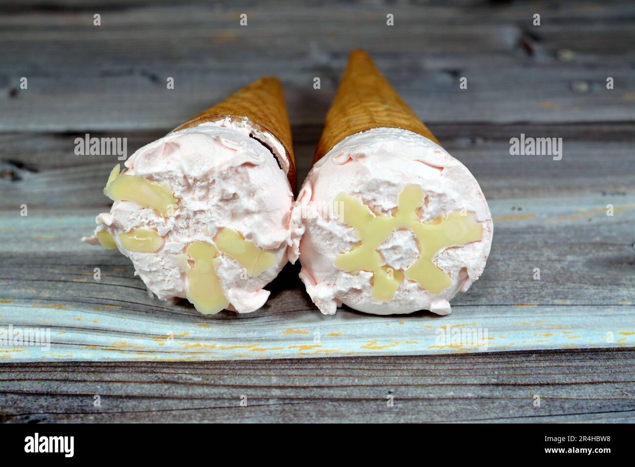 Ice-cream of special flavors in crispy wafer cones, melting cold ice ...