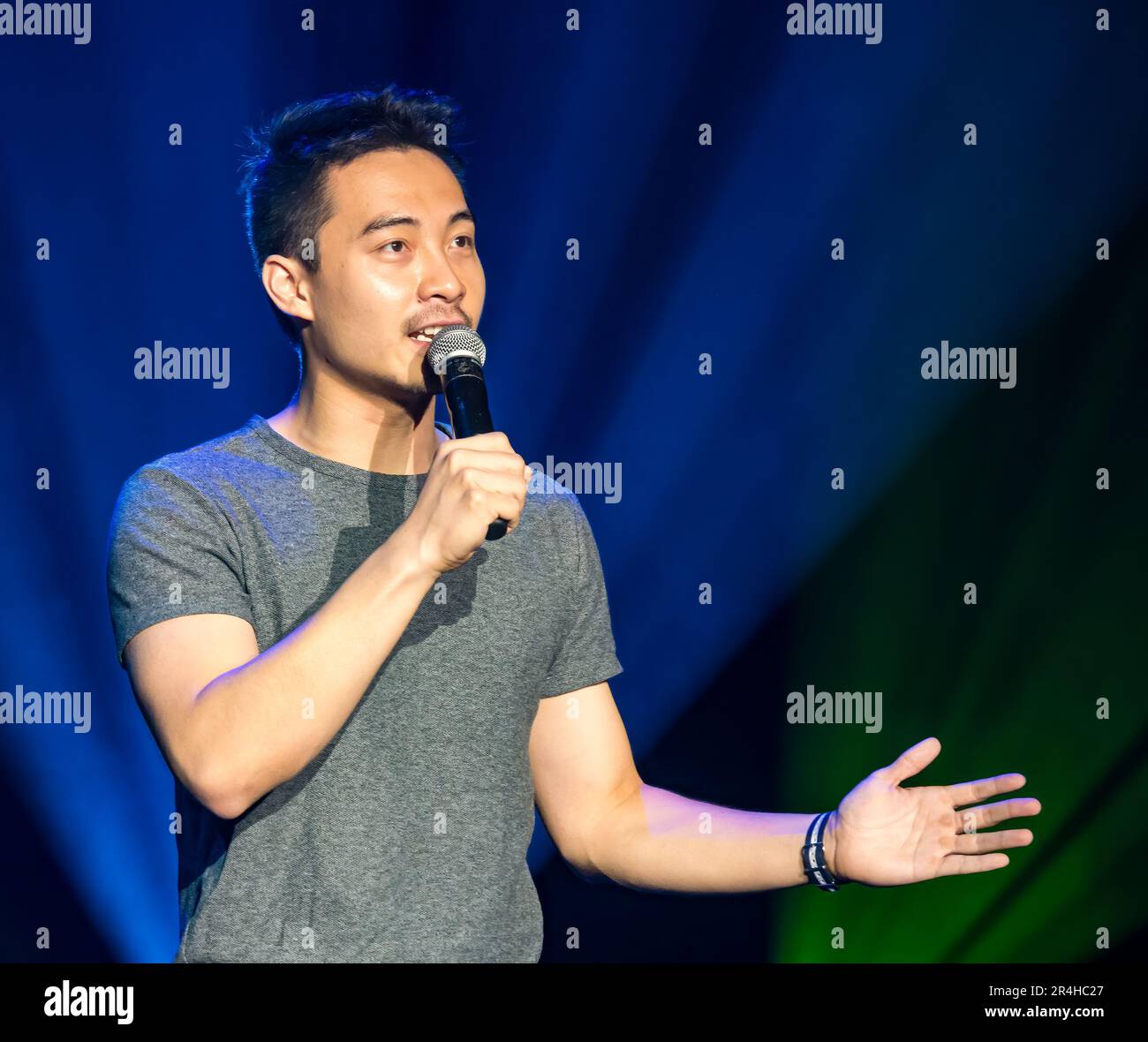 Malaysian comedian Nigel Ng performing on stage at Edinburgh Festival ...