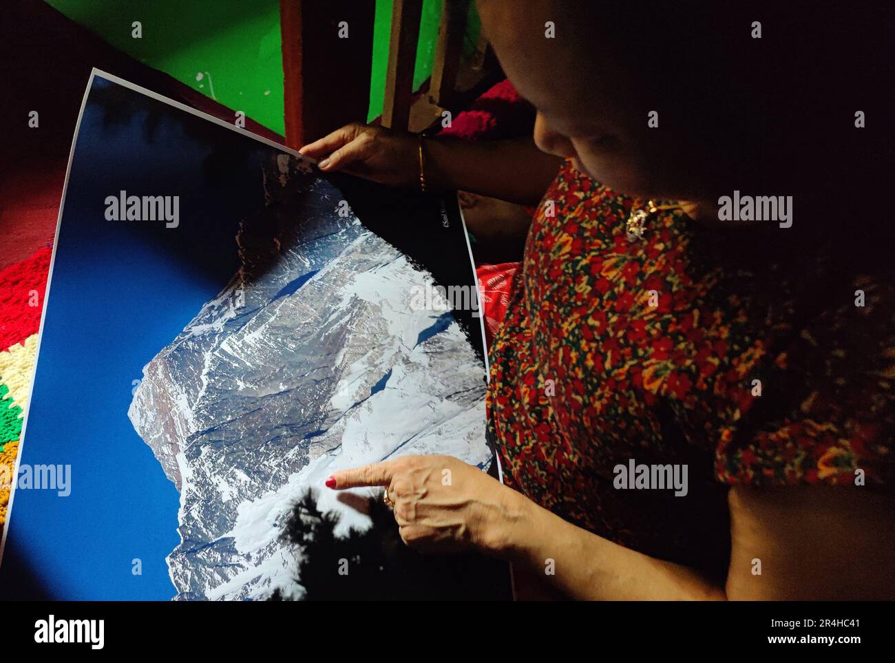 Kathmandu, Bagmati, Nepal. 28th May, 2023. A Nepali woman holds a photo ...