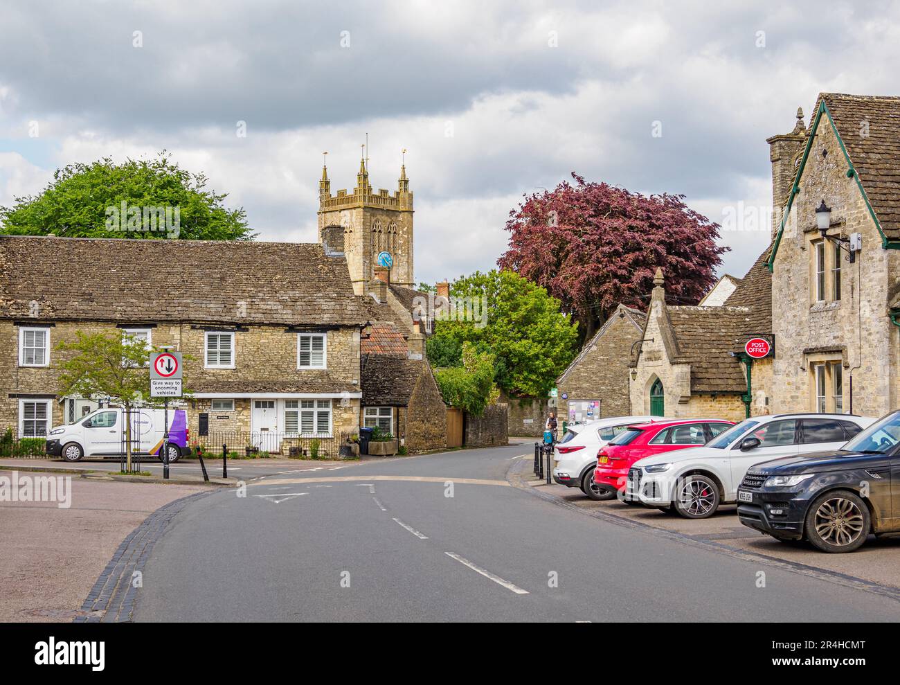 Broad main street in the village of Sherston in Wiltshire UK with the ...