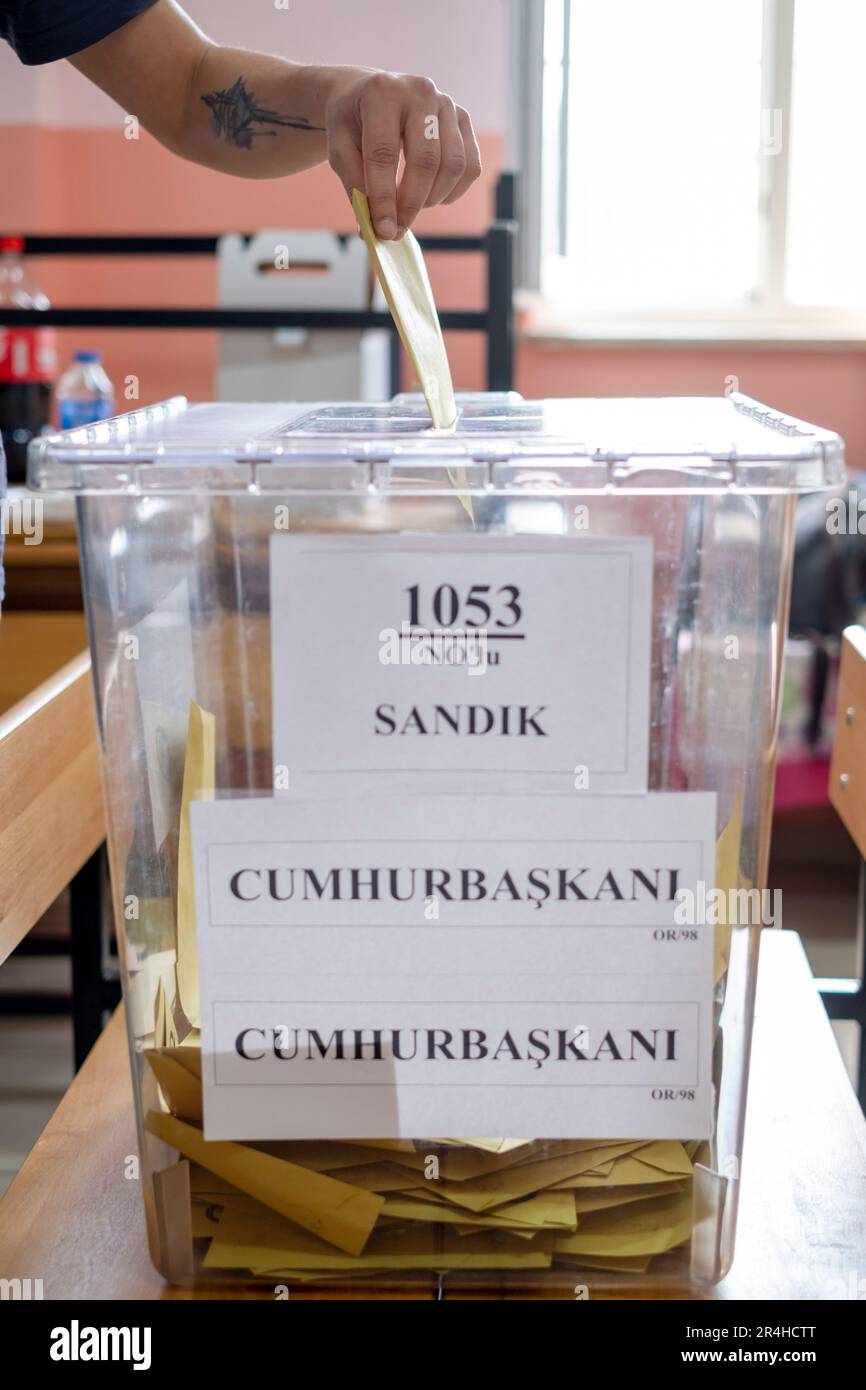 The man is Turkish presidential election. The man is holding the ballot ...