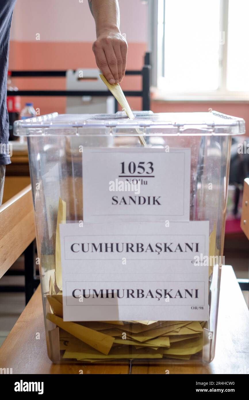 The man is Turkish presidential election. The man is holding the ballot ...