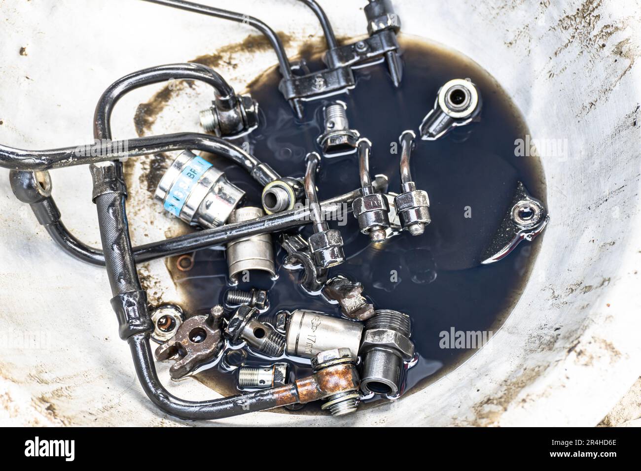 Close-up, a fuel pump has all connector elements separated from the ...