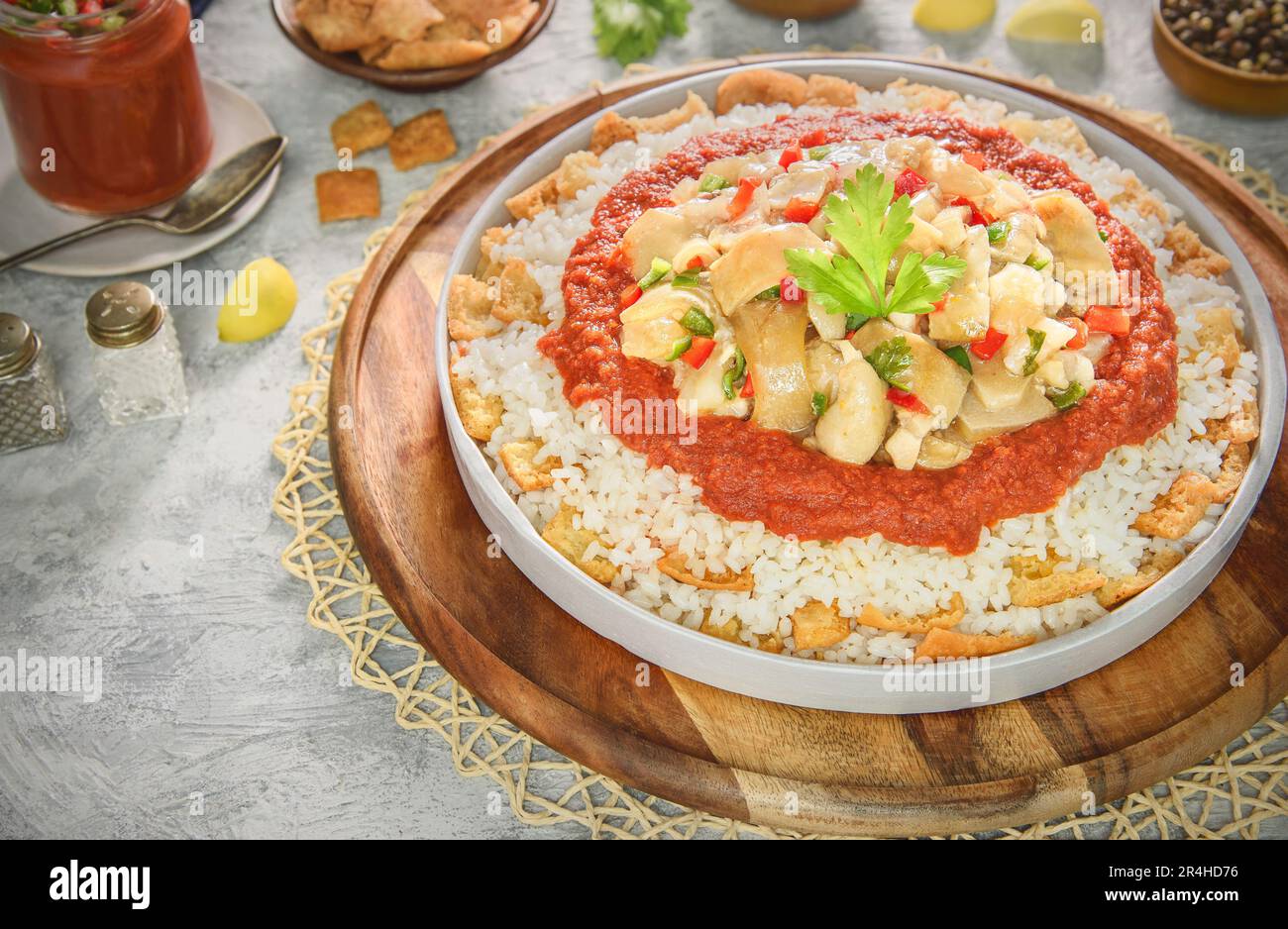Arabic cuisine; Egyptian oriental Fattah with white rice and crispy ...