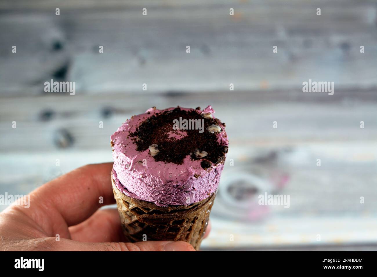 Ice-cream of special flavors in crispy wafer cones, melting cold ice ...