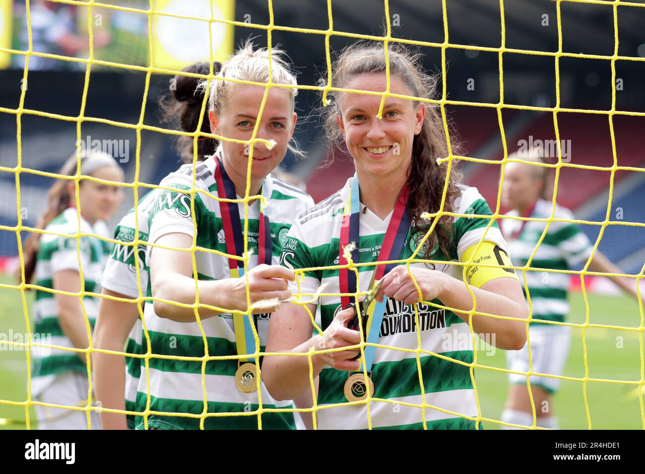 Celtic's Kelly Clark (right) cuts the goal netting after the Women's ...