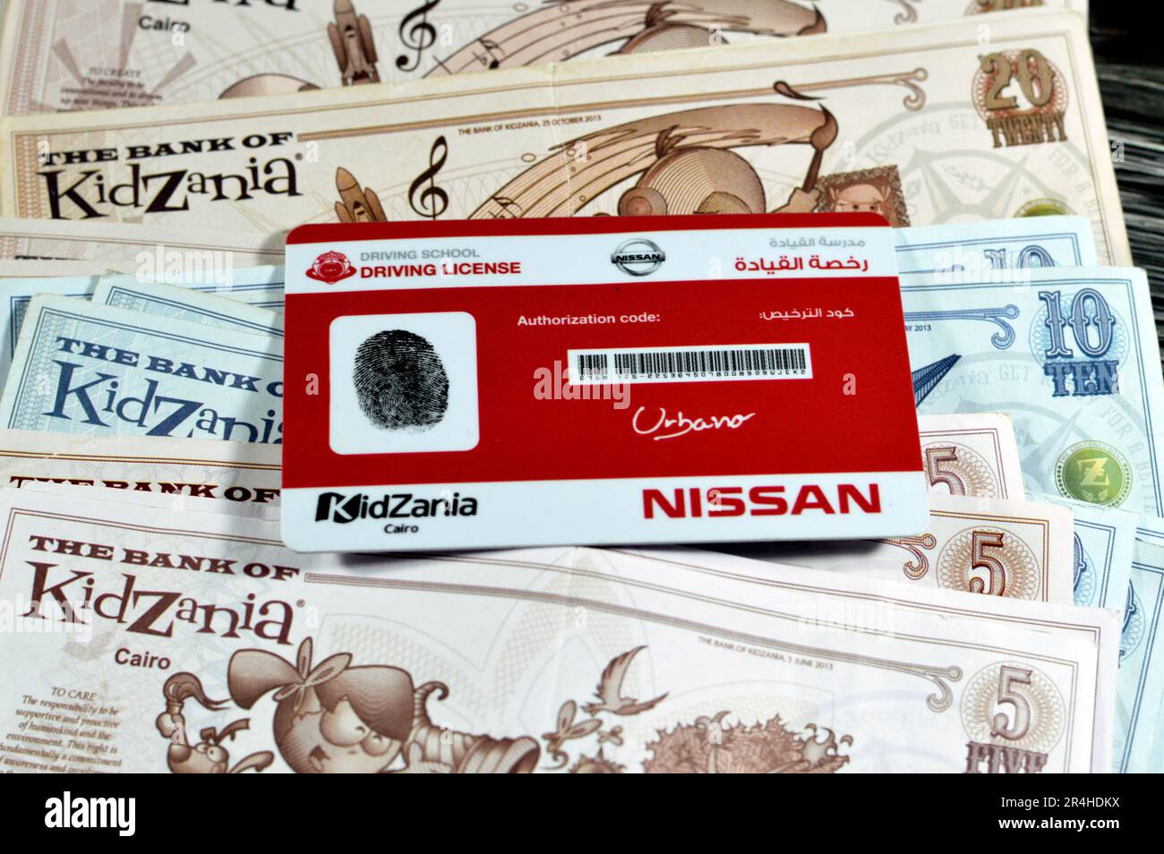 Cairo, Egypt, May 26 2023: KidZos money, Driving license of KidZania, a ...