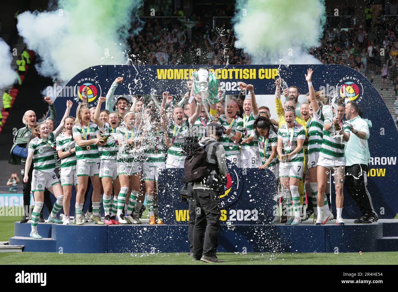 Celtic's Kelly Clark (centre) celebrates with team-mates whilst lifting ...