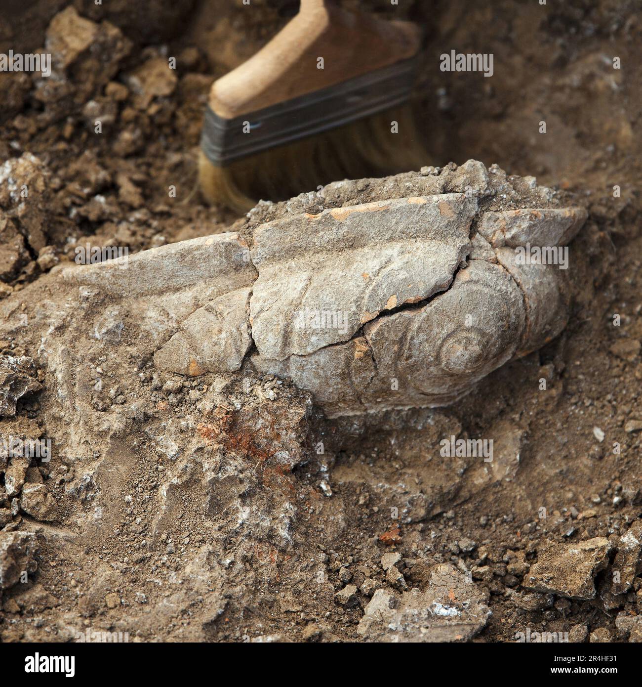 Archaeological excavations, archaeologist work, dig up an ancient clay ...