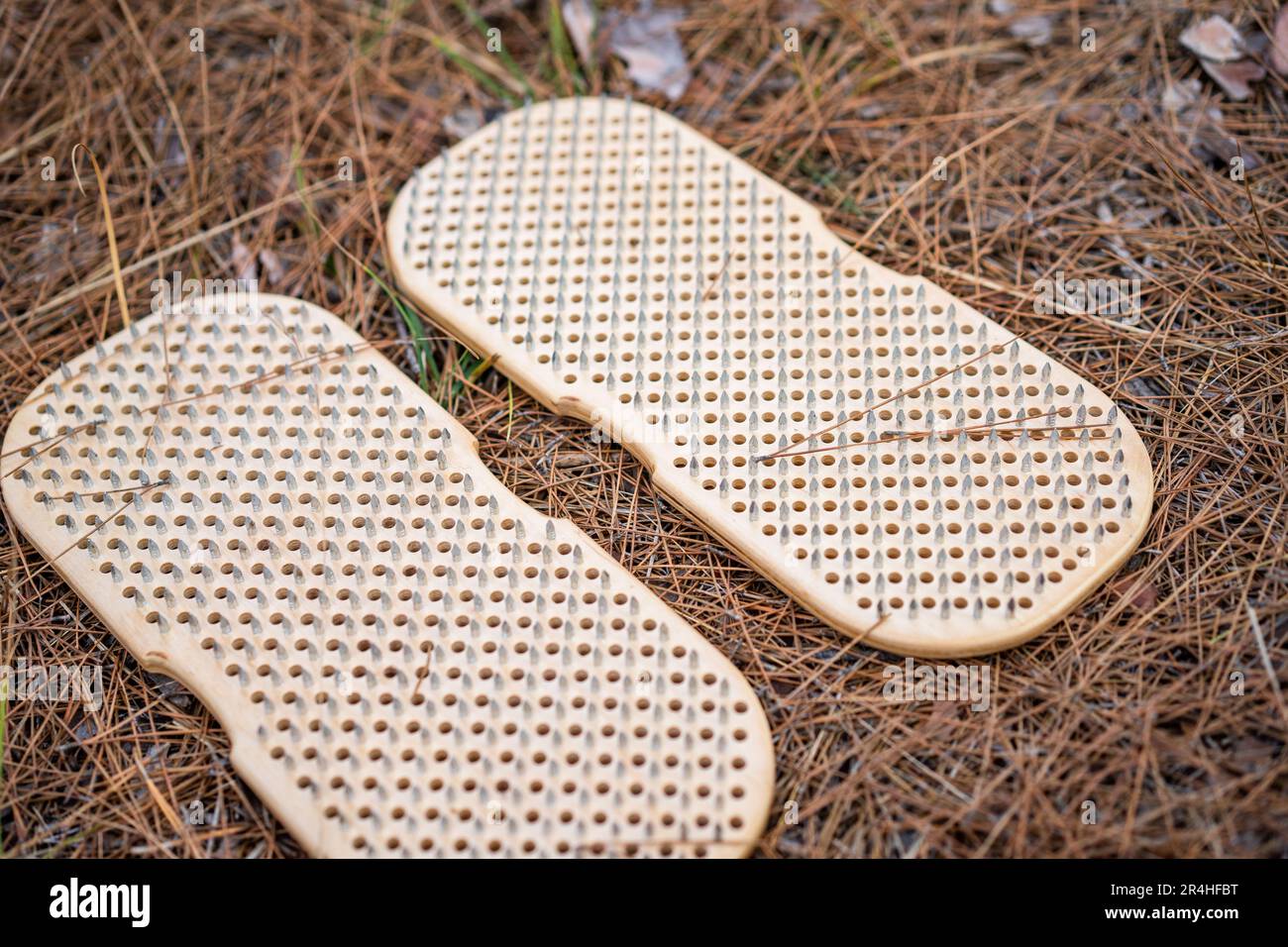 Sadhu board The practice of standing on nails. Yoga concept Stock Photo ...