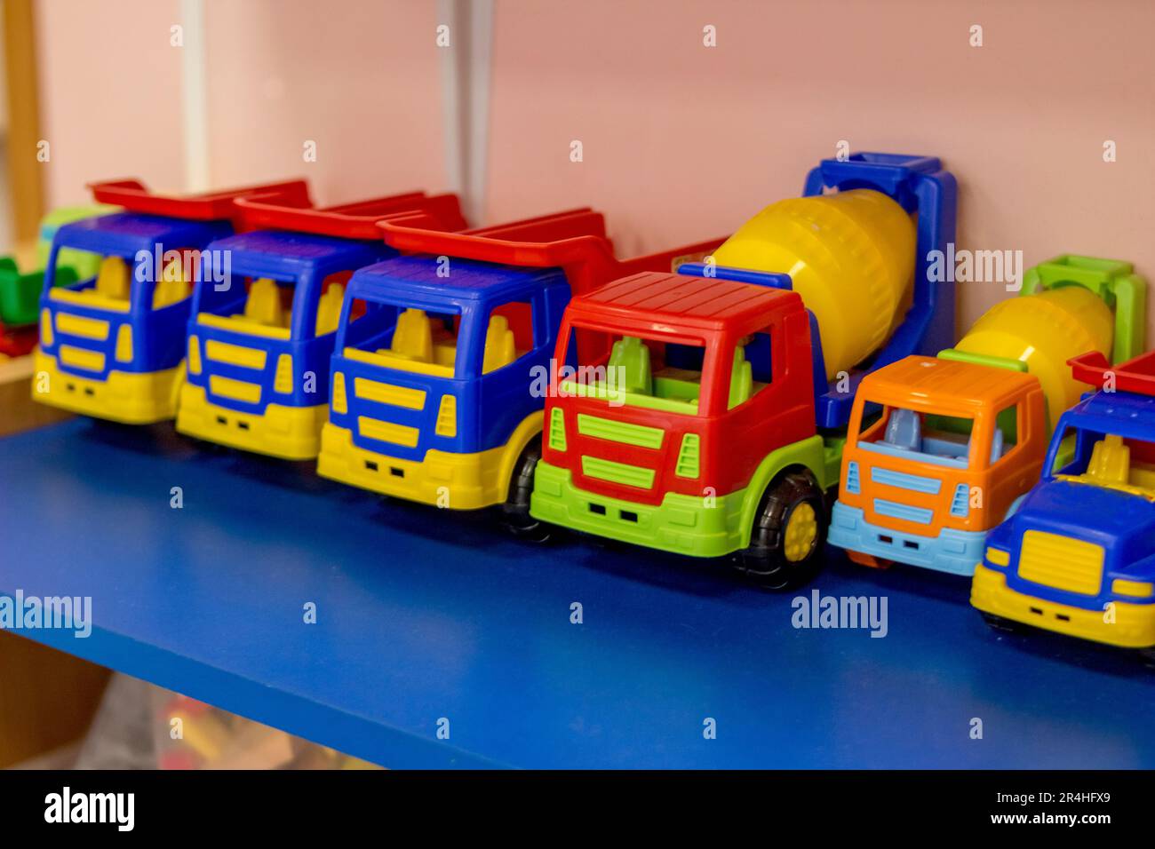 Color toy car. Colorful toy truck isolated on white background. Plastic ...