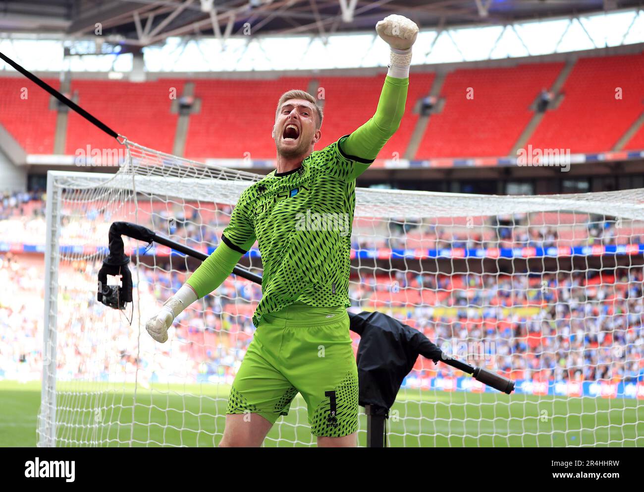 Carlisle United goalkeeper Tomas Holy celebrates after winning the Sky ...