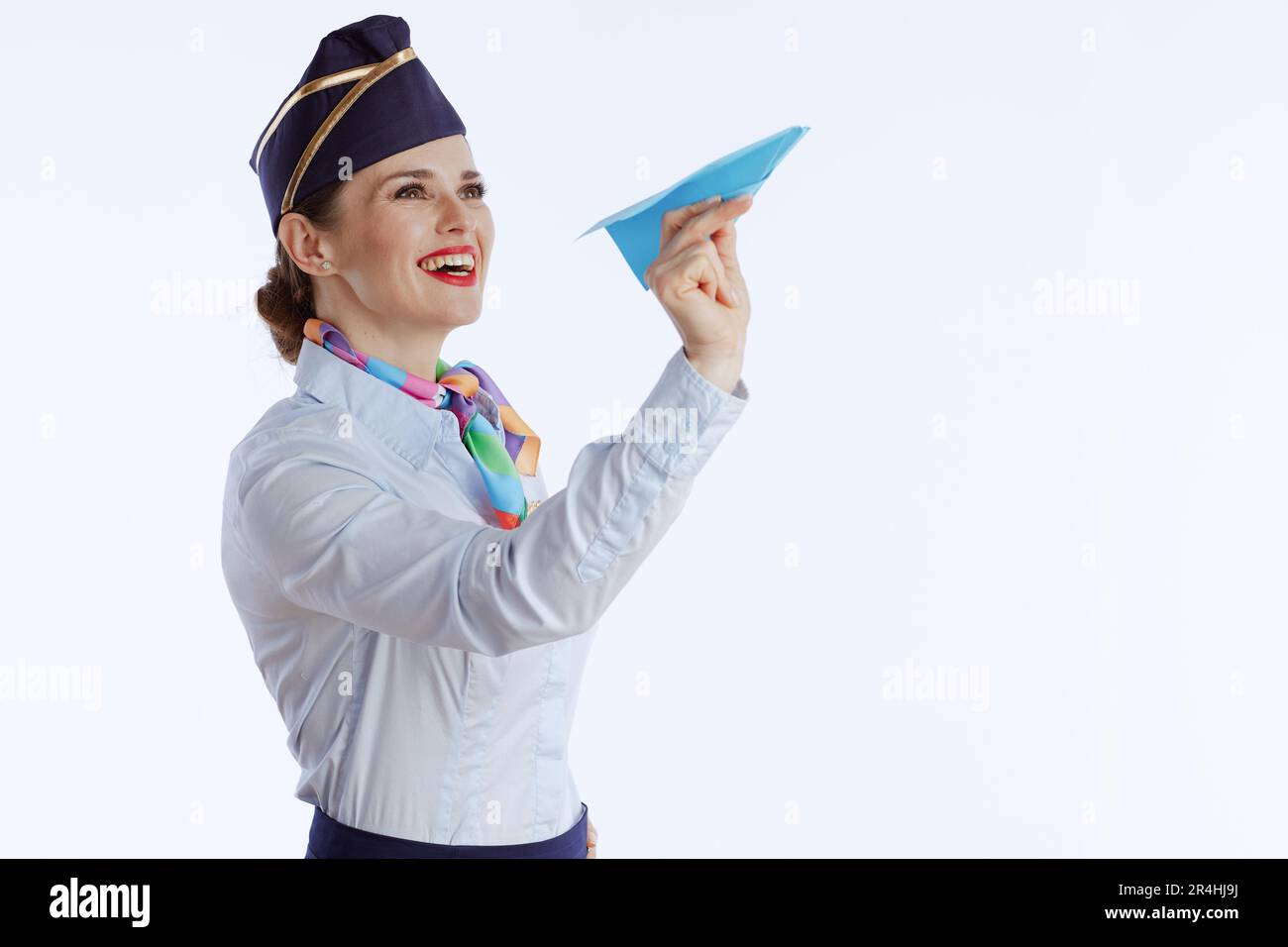 smiling elegant flight attendant woman isolated on white background in ...